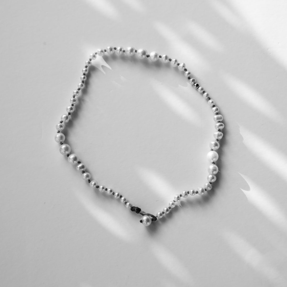 MARICHELLE / CLASSIC PEARL NECKLACE, BLACK CORD – RIKA STUDIOS